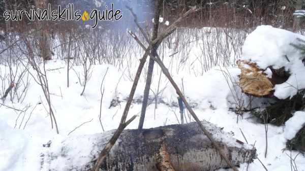 tripod-over-log – Survival Skills Guide
